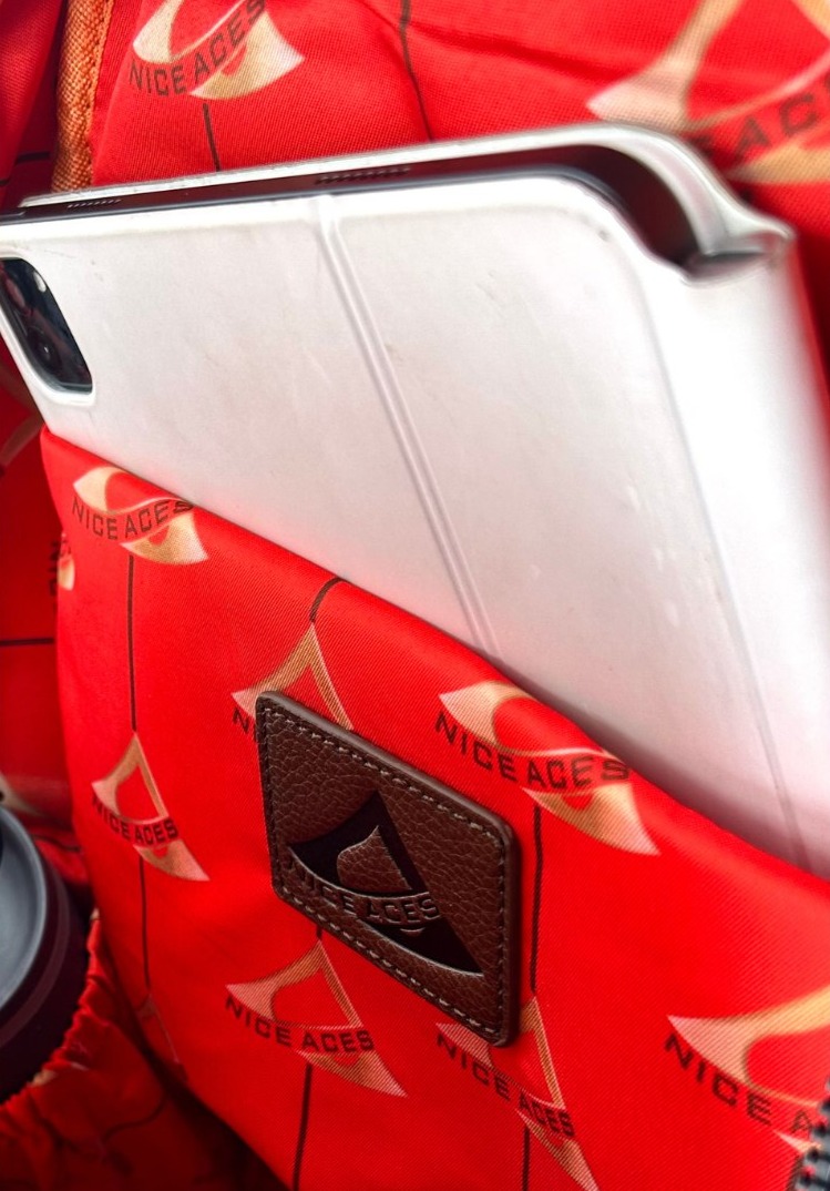 NiceAces Neon Ultra-Lite Tennis & Pickleball Puffer Backpack (Turquoise)